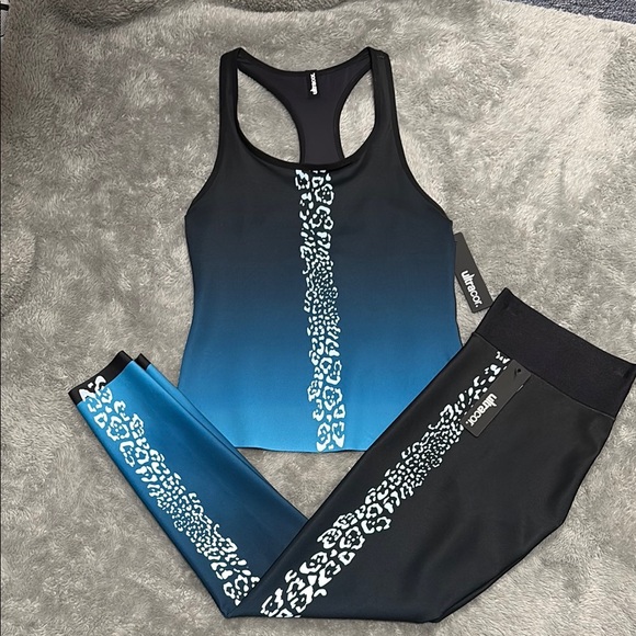 ultracor | Pants & Jumpsuits | Ultracor Blue And Black Leopard Print ...